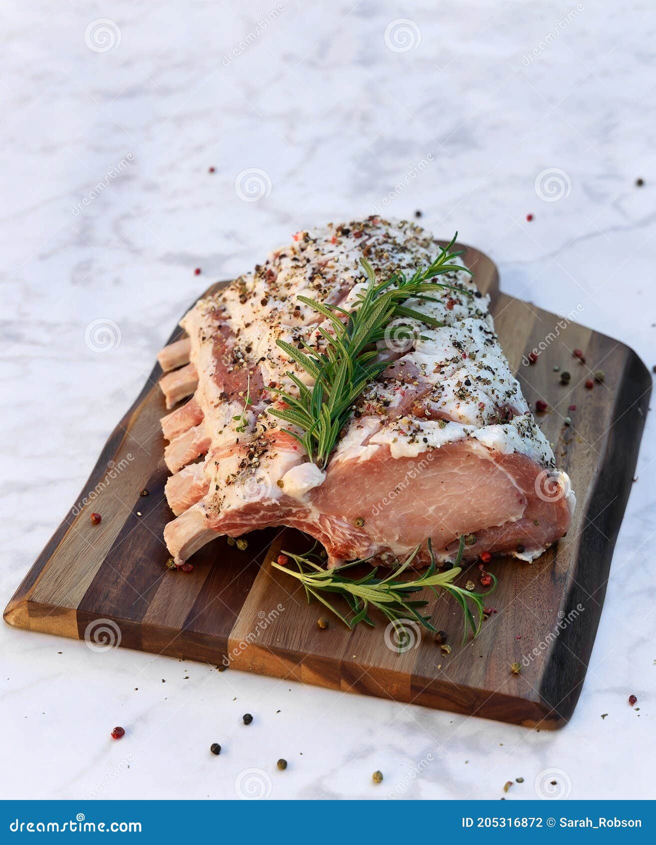 Raw Rack of Pork on the Cutting Board Stock Photo - Image of board ...
