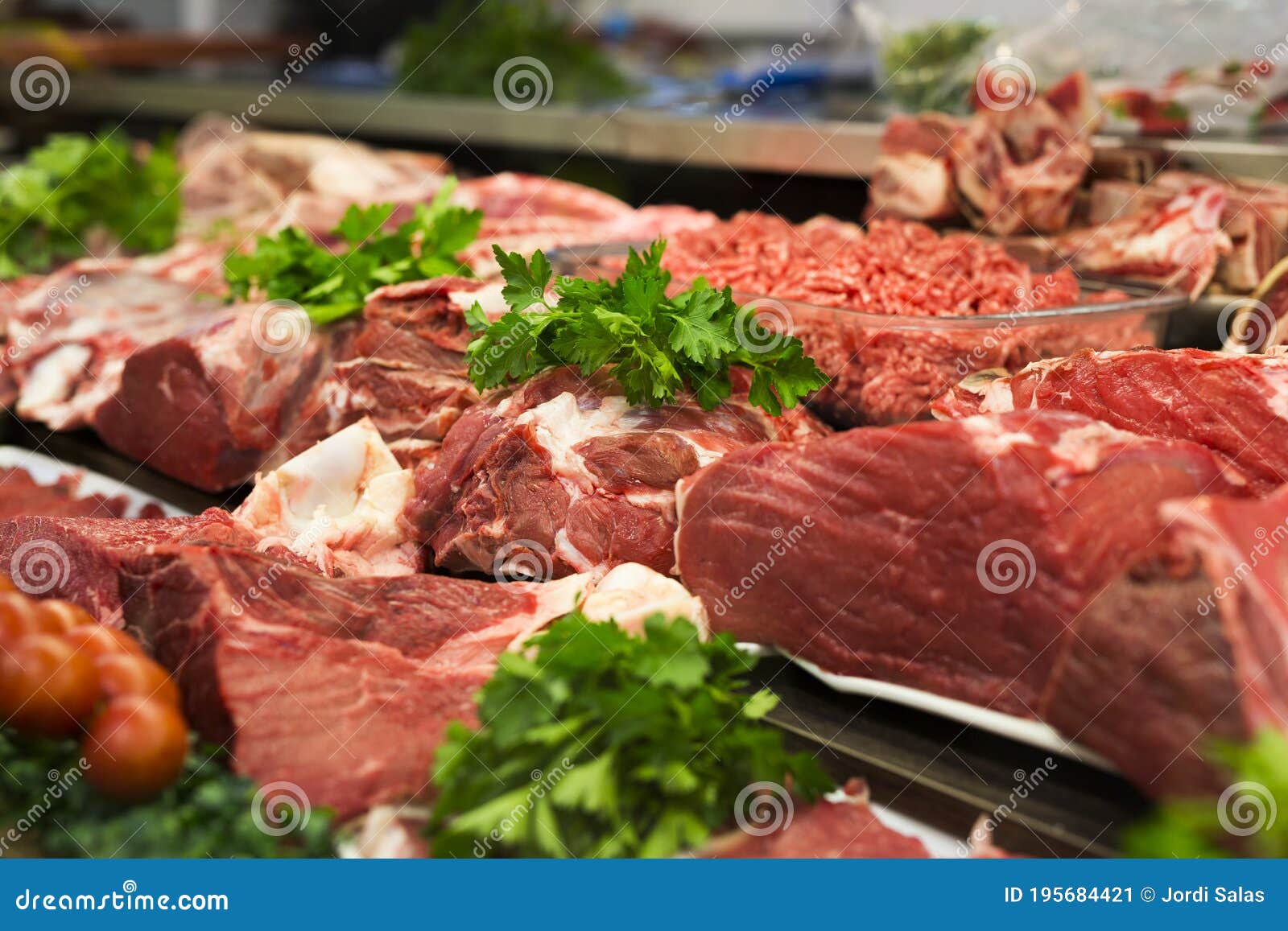 Raw red meat in a butchery stock image. Image of beef - 195684421
