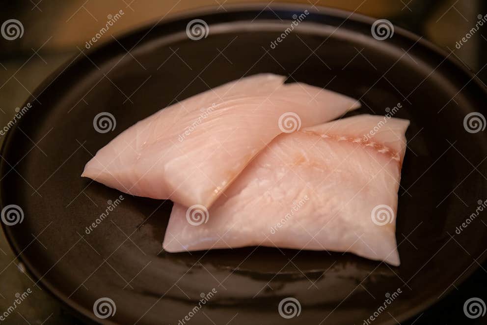Raw Red Snapper Filets stock photo. Image of portion - 313763574