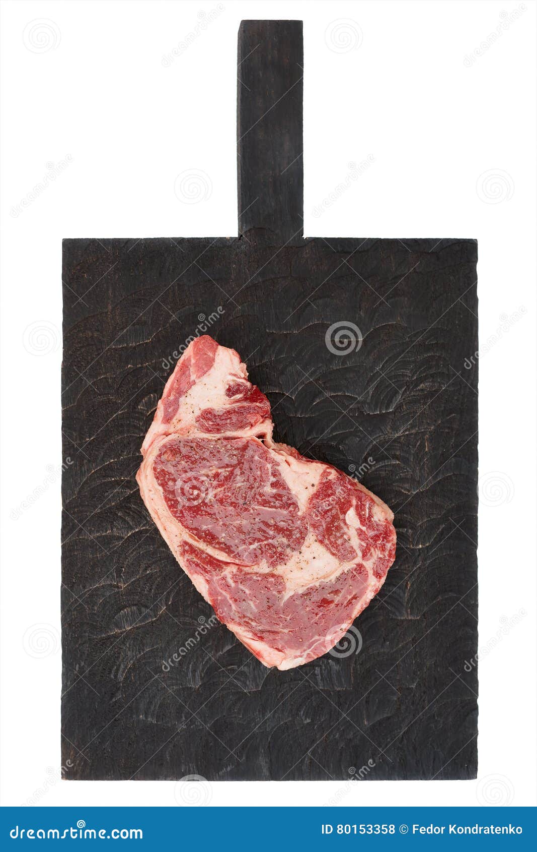 Raw Rib-eye Steak on Cutting Board, Isolated Stock Photo - Image of ...