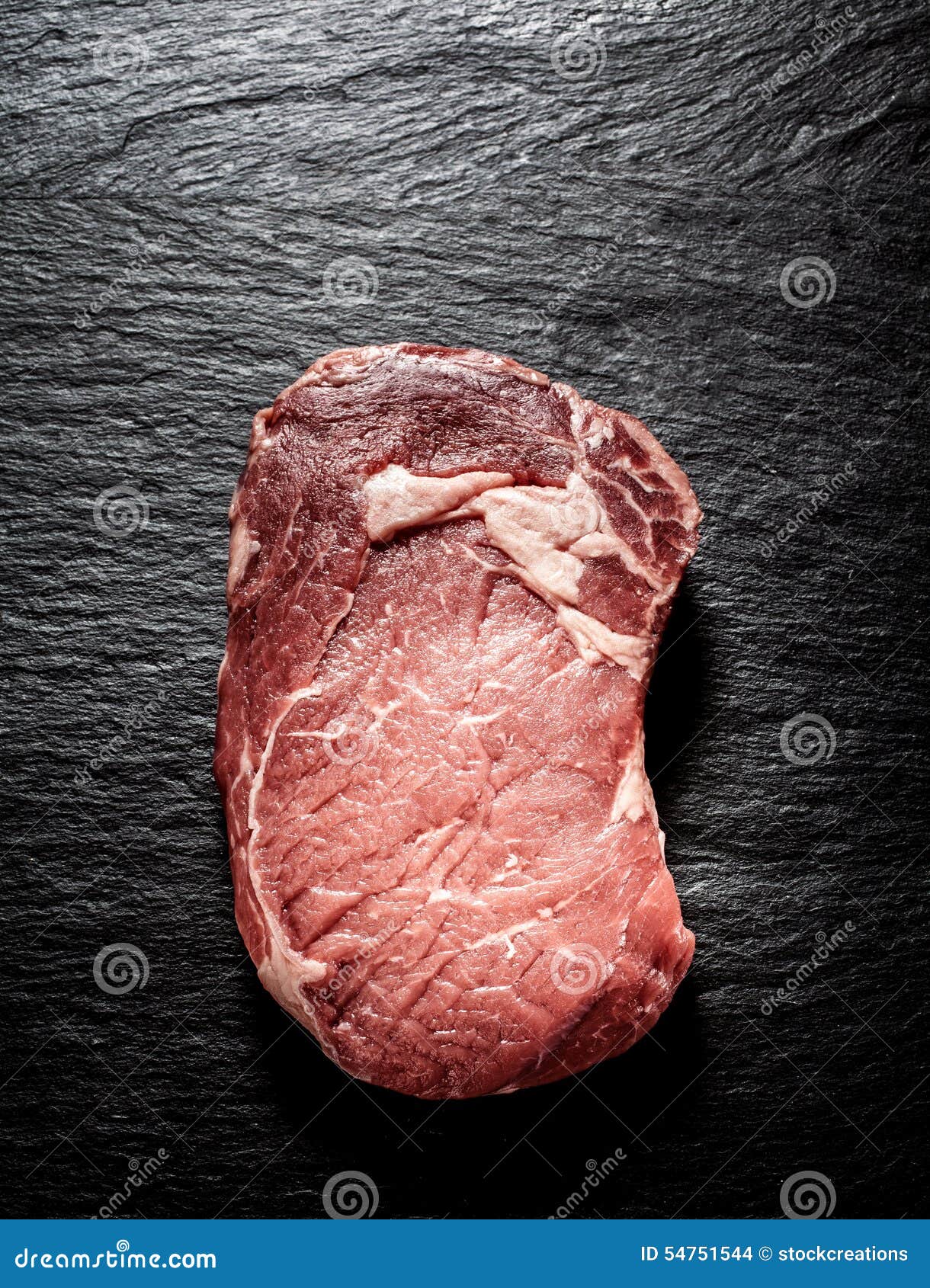 Raw Rib Eye Steak on Dark Grey Textured Surface Stock Photo - Image of ...