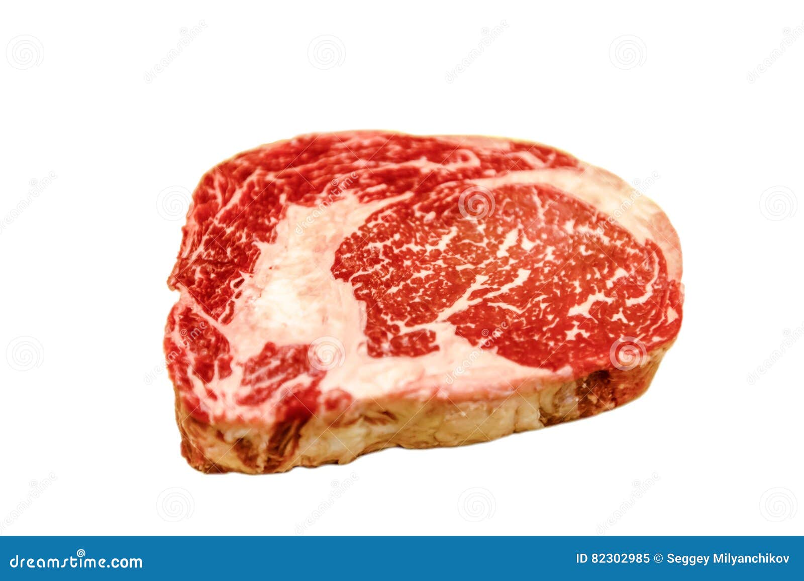 Raw Ribeye Beef Lies on a White Background. Stock Image - Image of ...
