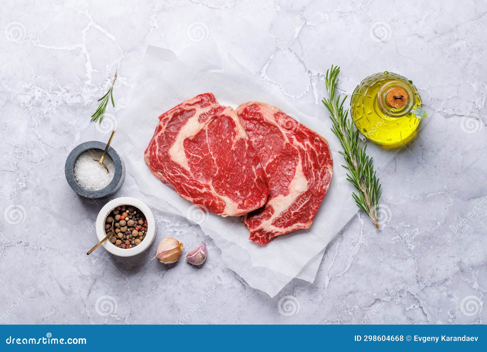 Raw Ribeye Steaks with Savory Spices Stock Photo - Image of uncooked ...