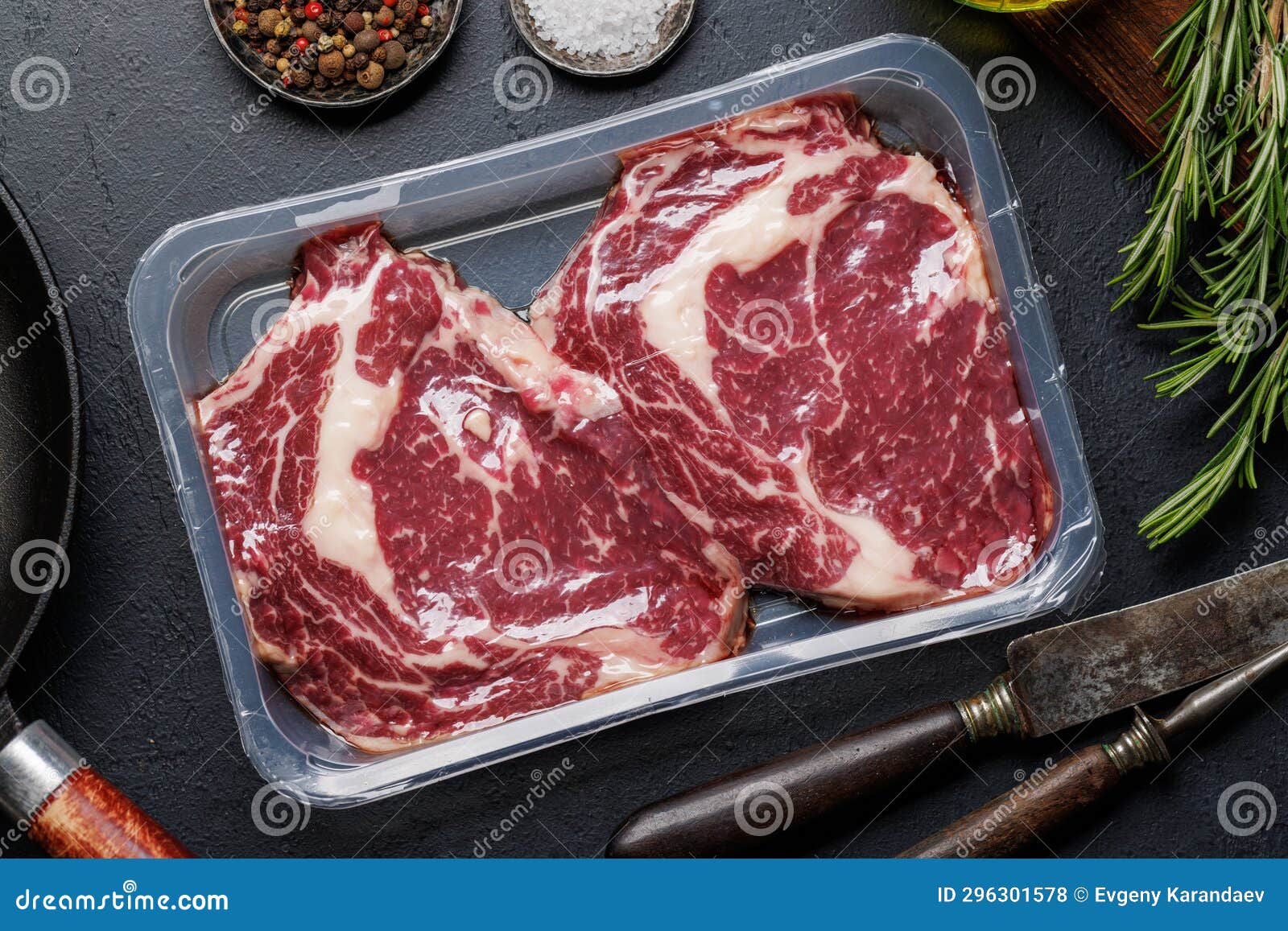 Raw Ribeye Steaks with Savory Spices Stock Photo - Image of seasoning ...