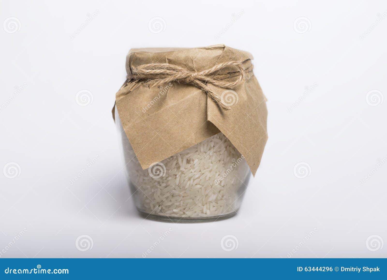 Raw rice in a jar on whit stock photo. Image of canning - 63444296