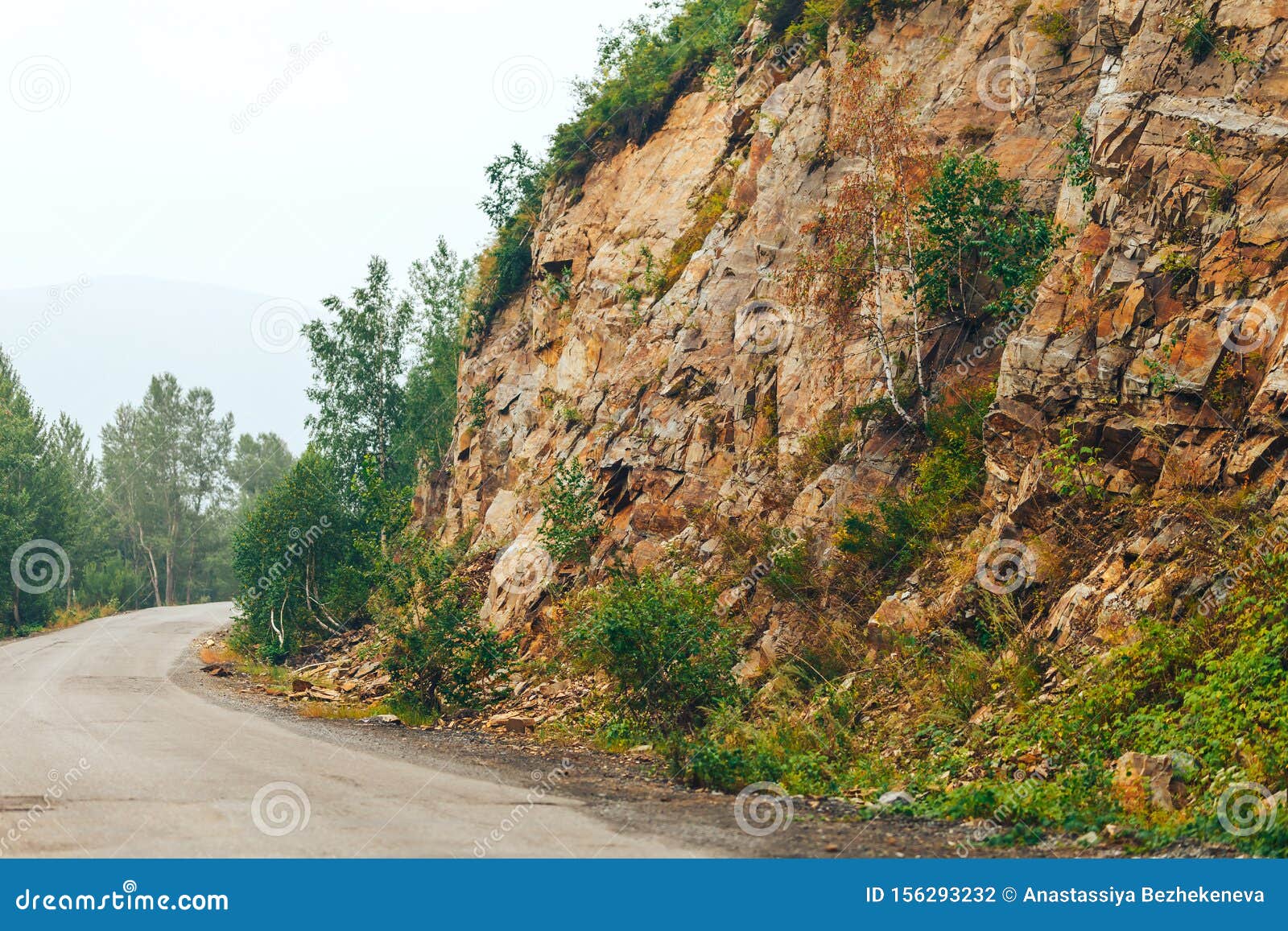 Raw Road with Rock Mountain and Green Trees Stock Photo - Image of dawn ...