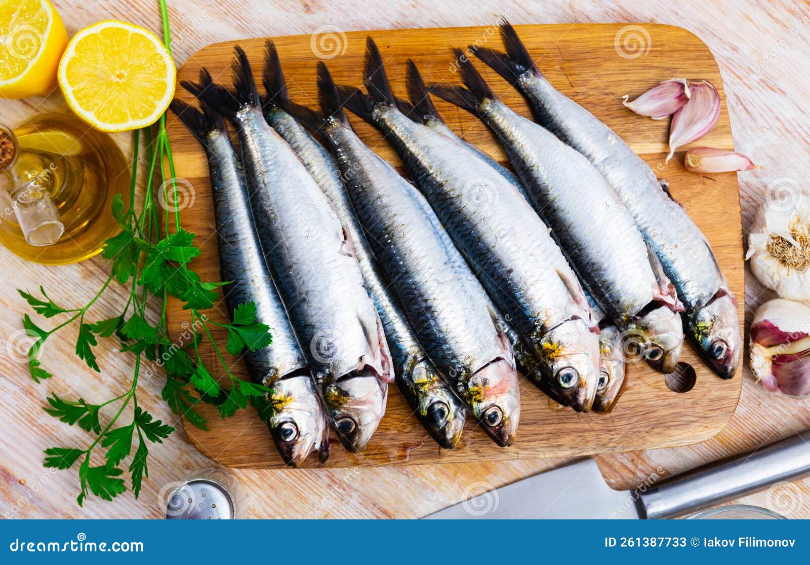 Raw Sardines on Wooden Cutting Board Stock Image - Image of freshness ...