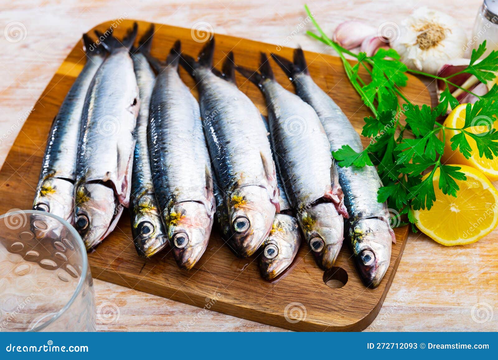 Raw Sardines on Wooden Cutting Board Stock Image - Image of food, salt ...