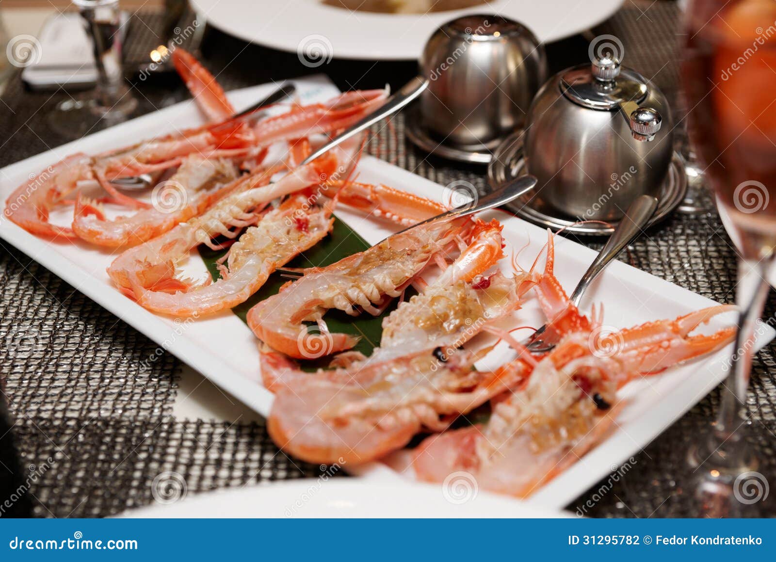 Raw Scampi Dish on Restaurant Table Stock Photo - Image of carpaccio ...
