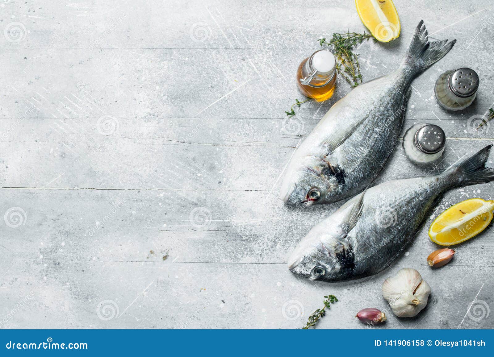 Raw Sea Fish Dorado with Herbs and Spices Stock Photo - Image of marine ... Raw Sea Fish Dorado with Herbs and Spices Stock Photo - Image of marine ...