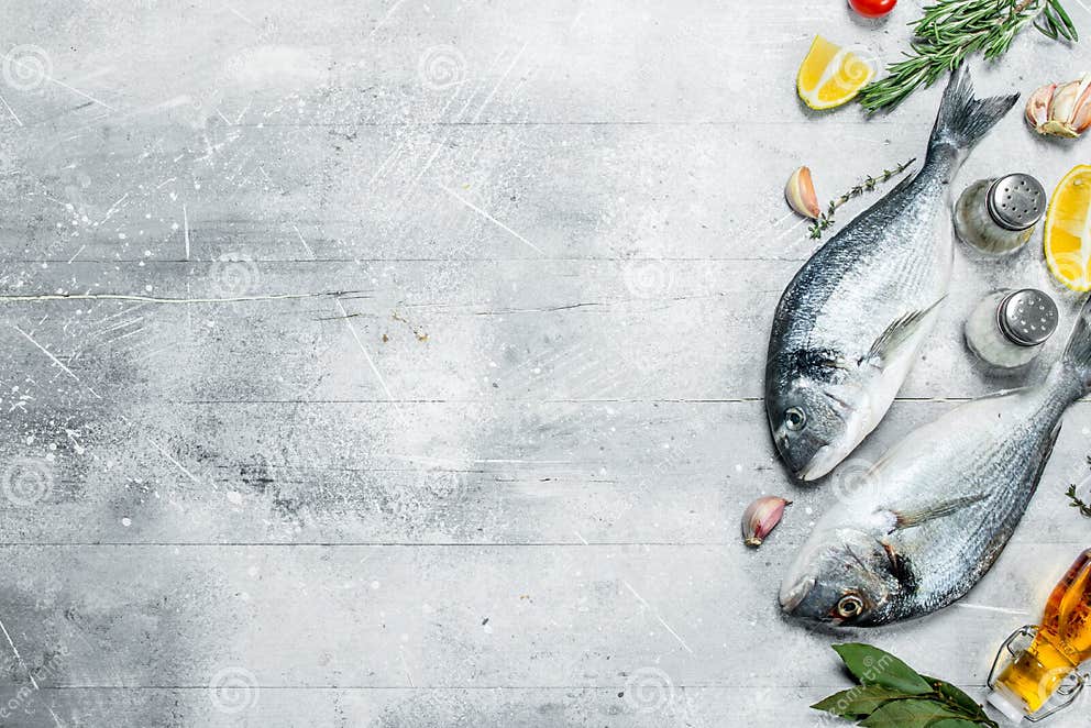 Raw Sea Fish with Lemon Wedges and Spices Stock Image - Image of slice ... Raw Sea Fish with Lemon Wedges and Spices Stock Image - Image of slice ...