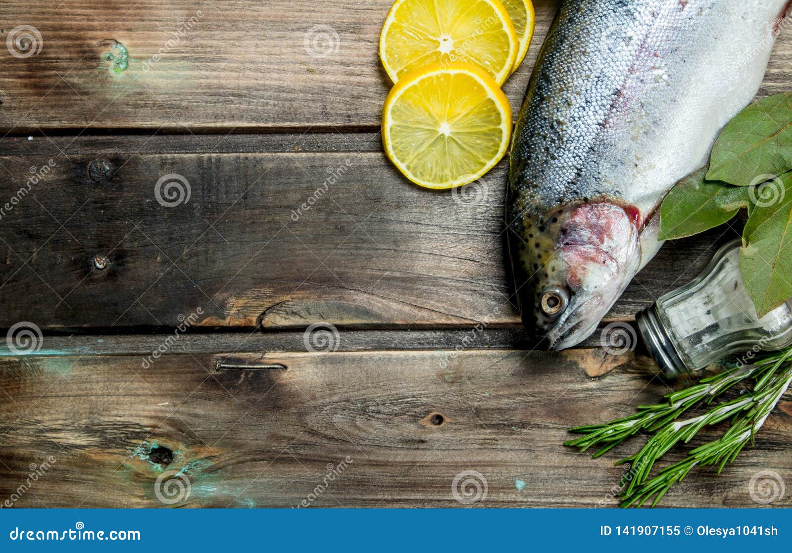 Raw Sea Fish Salmon with Lemon Wedges, Herbs and Spices Stock Image ... Raw Sea Fish Salmon with Lemon Wedges, Herbs and Spices Stock Image ...