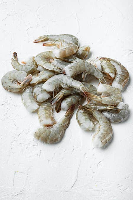 Raw Shell on King Prawns, on White Stone Surface, with Copy Space for ...