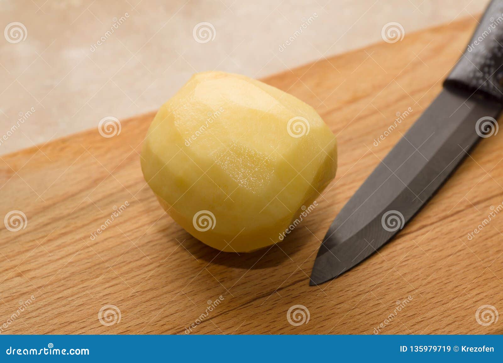 Raw skinned potato stock image. Image of diet, knife - 135979719