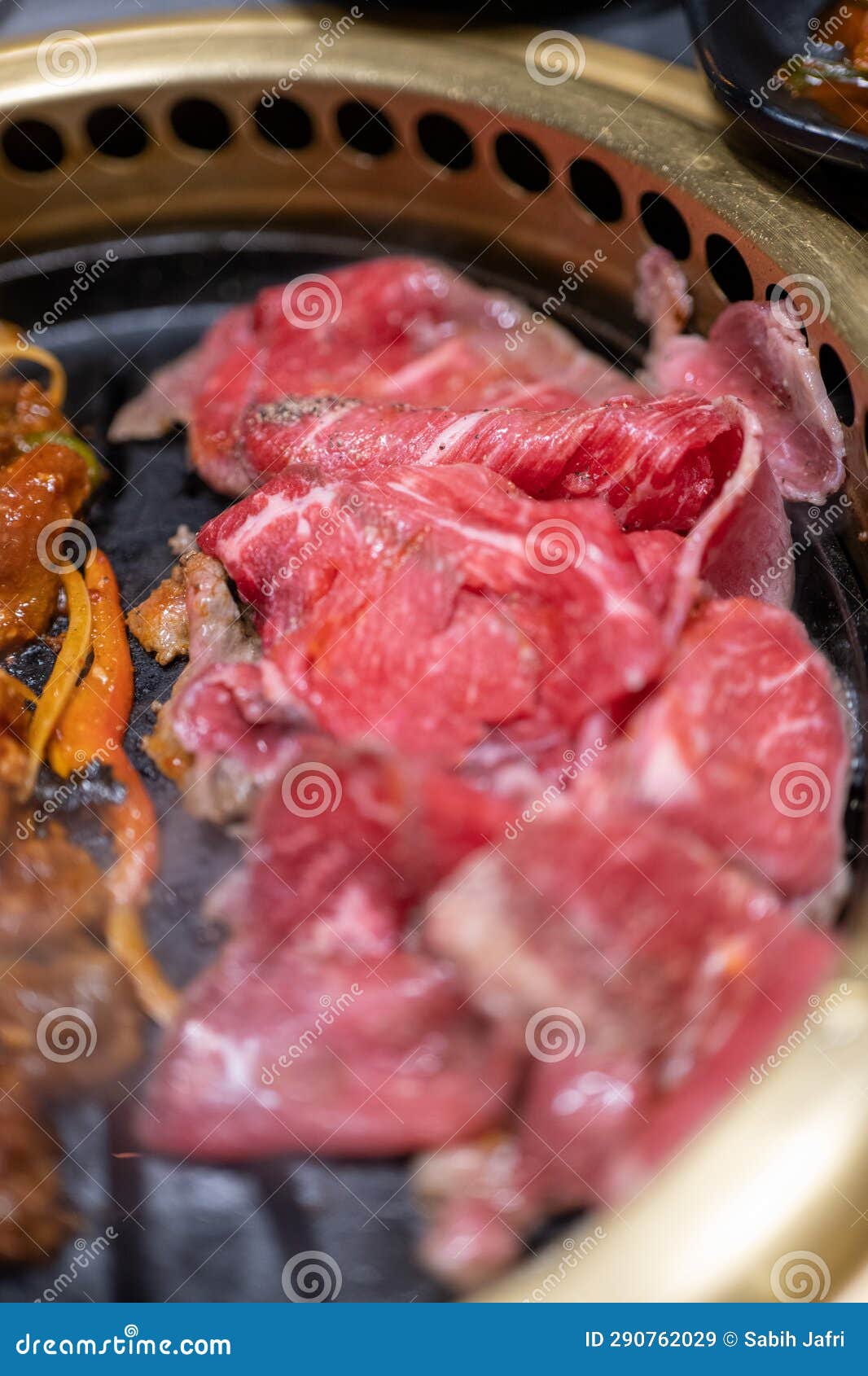 Raw Sliced Beef Cooking on the Grill Stock Image - Image of table, cook ...