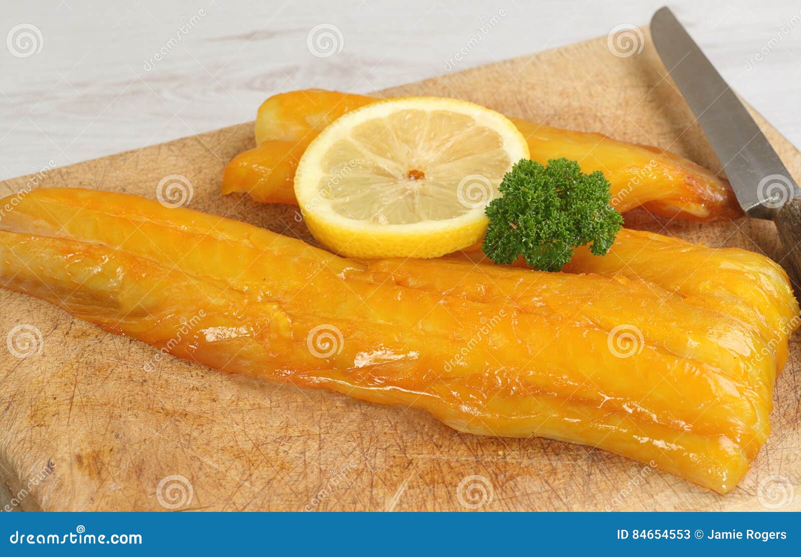 Raw smoked haddock stock image. Image of knife, fillet - 84654553