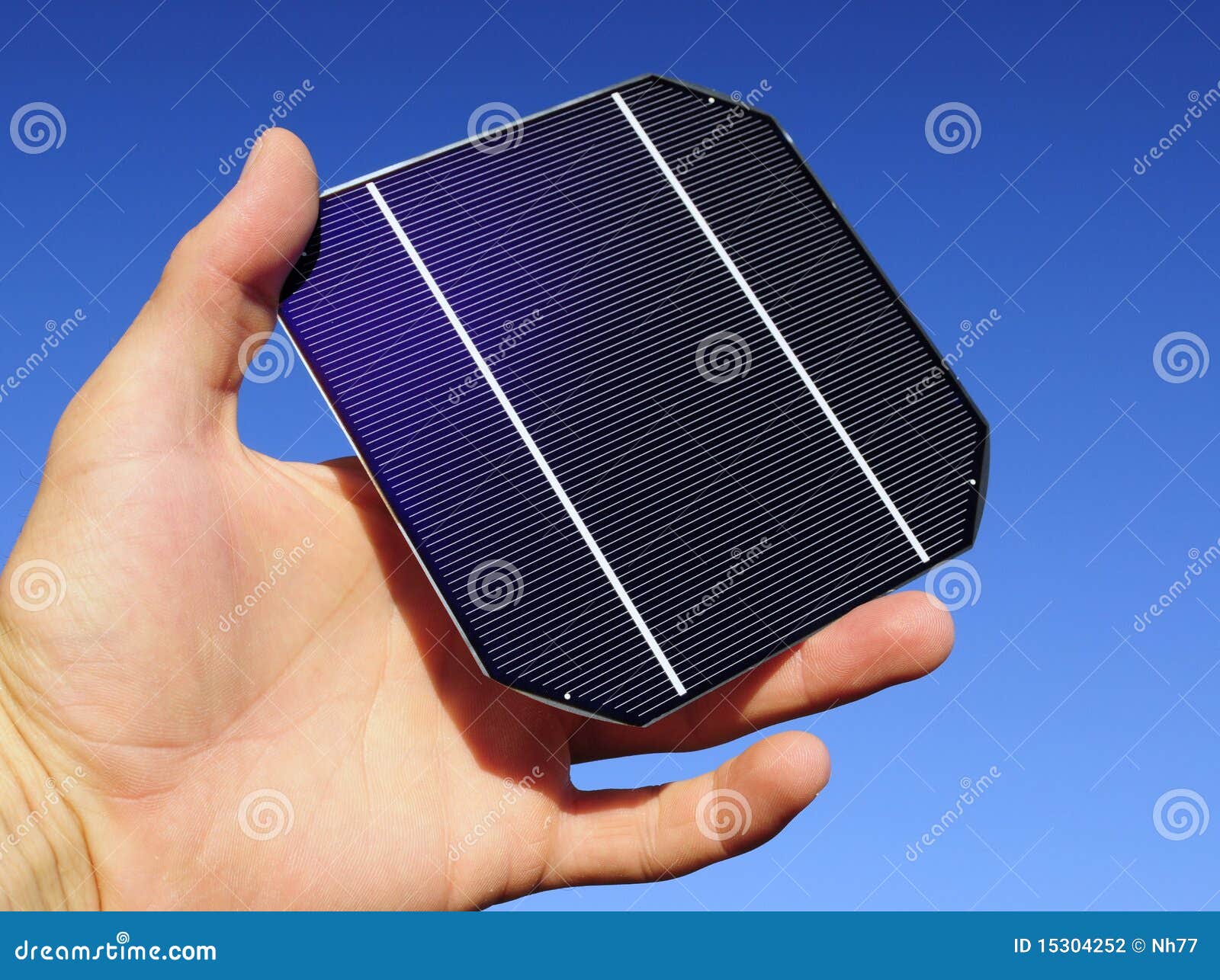 Raw solar cell in a hand stock photo. Image of hand, cell - 15304252