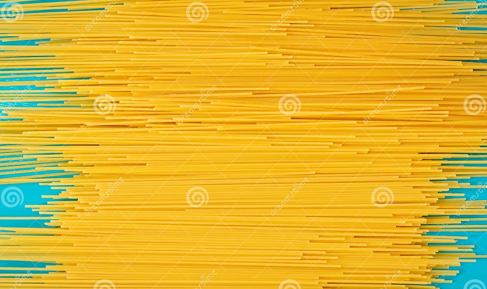 Raw Spaghetti in Horizontal Format Stock Photo - Image of yellow ...
