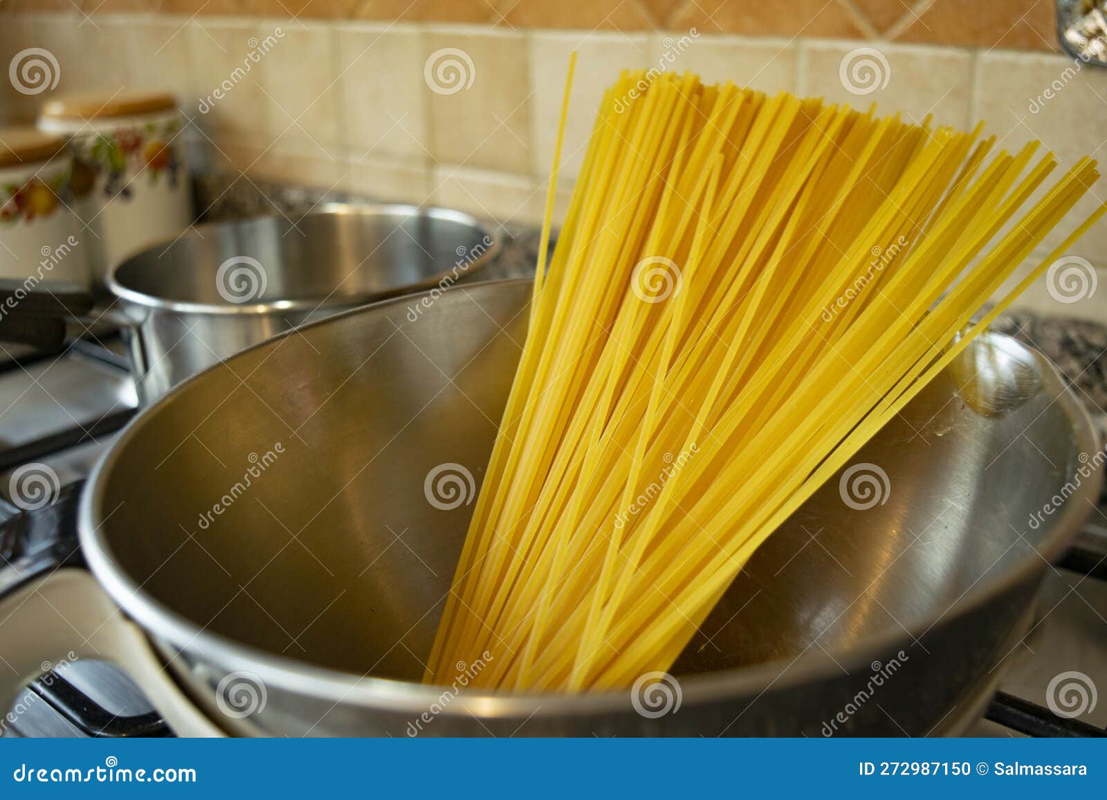 Raw spaghetti in pot stock photo. Image of cooking, preparing - 272987150