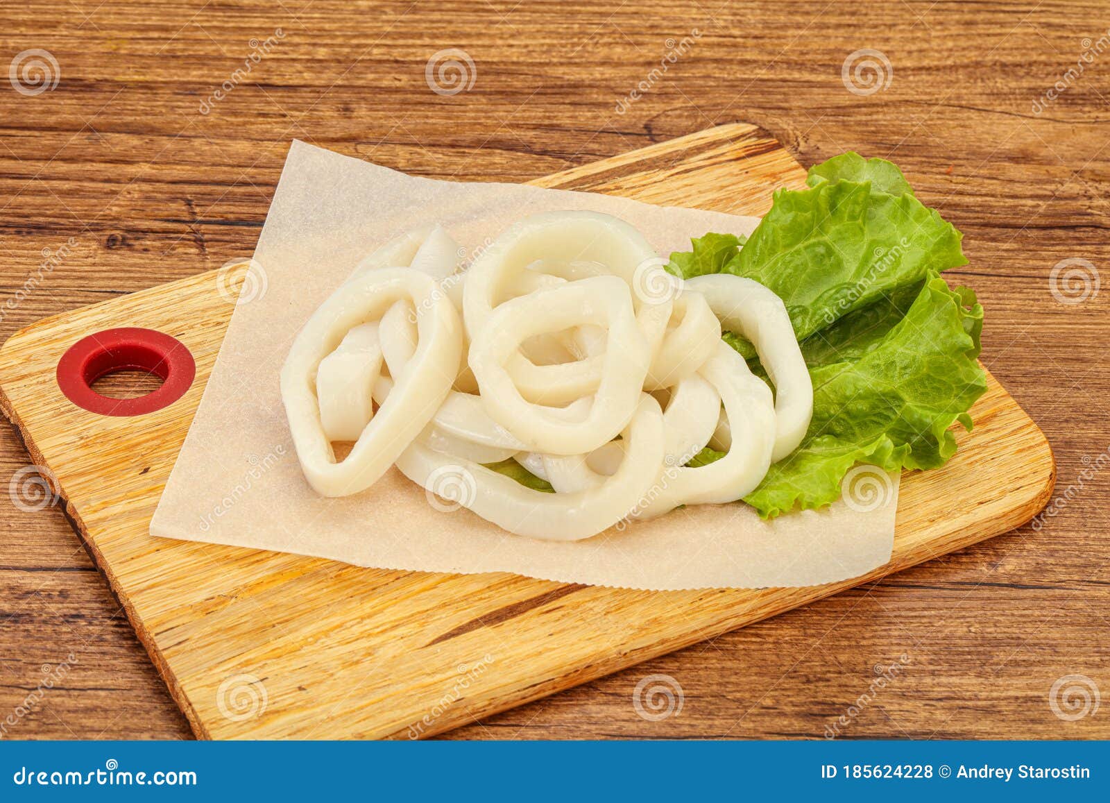 Raw Squid Rings for Cooking Stock Photo - Image of plate, lemon: 185624228
