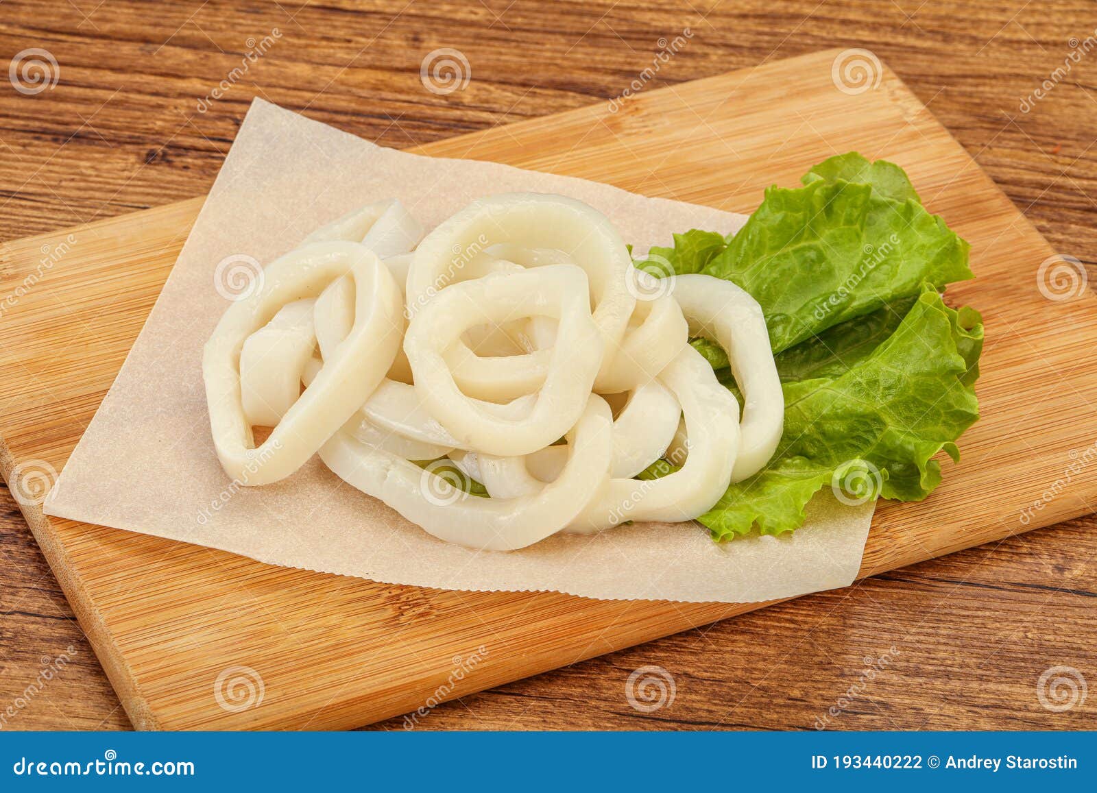 Raw Squid Rings for Cooking Stock Photo - Image of seafood, lemon ...