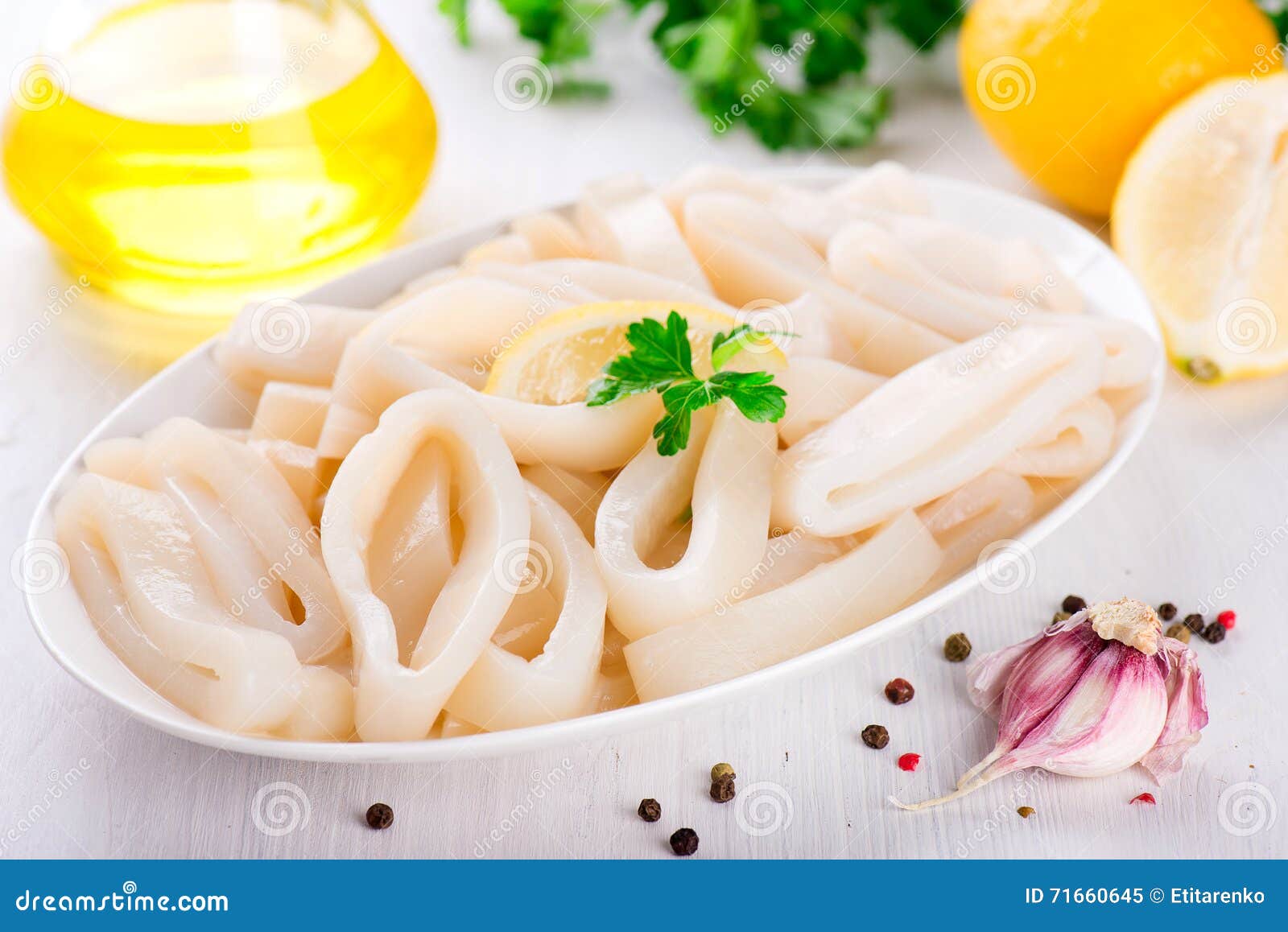 Raw Squid Rings on White Plate, Ready To Cook Stock Image - Image of ...