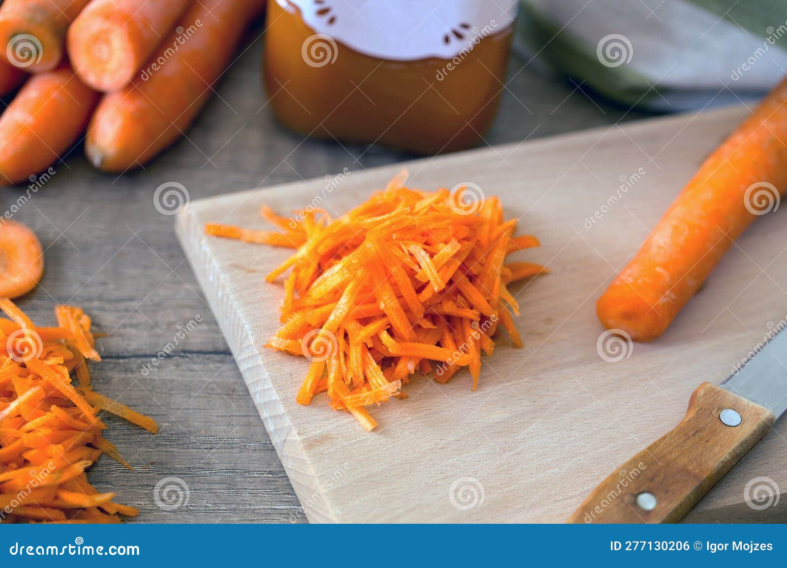 Raw Strips Sliced Carrot on Cutting Board Stock Photo - Image of diet ...
