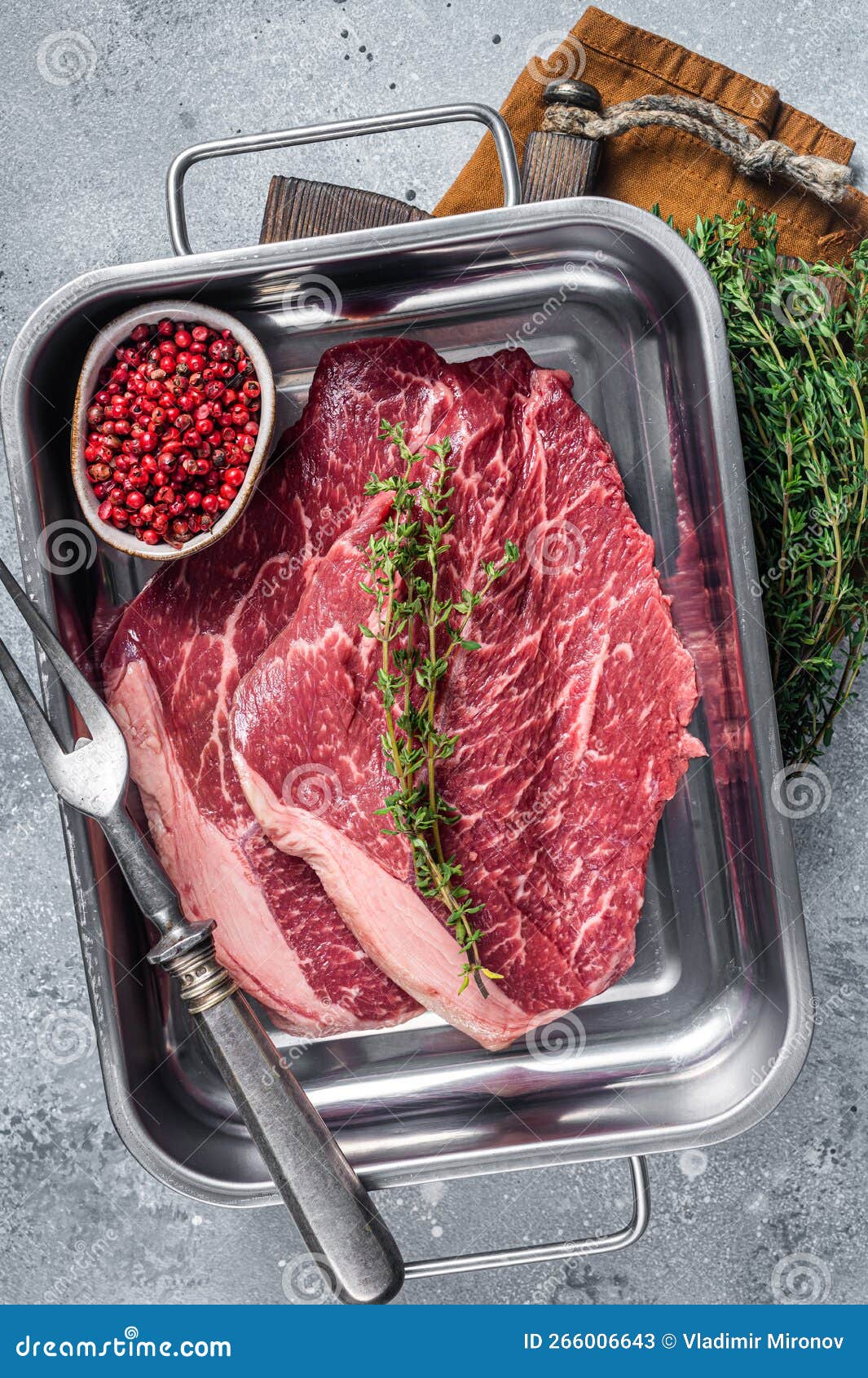 Raw Thin Marbled Beef Steak with Spices in Kitchen Tray. Gray ...