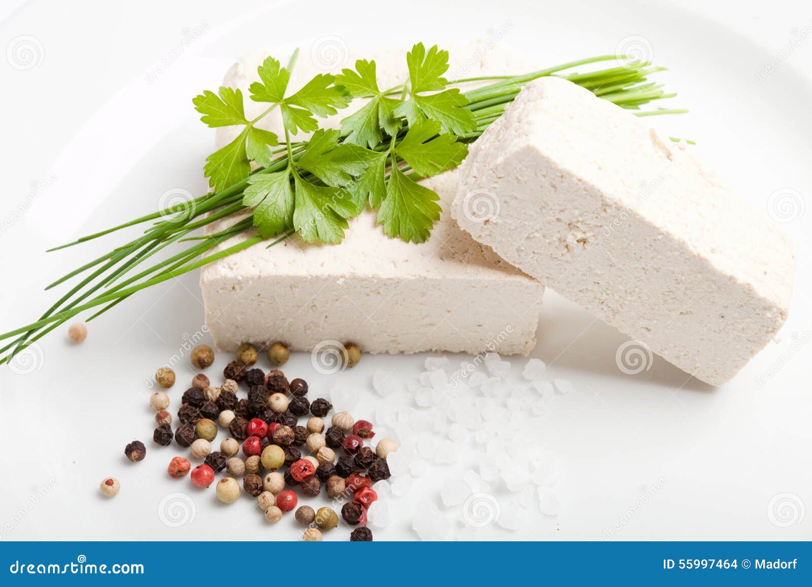 Raw Tofu Cubes with Spices and Herbs on White Plate Stock Photo - Image ...