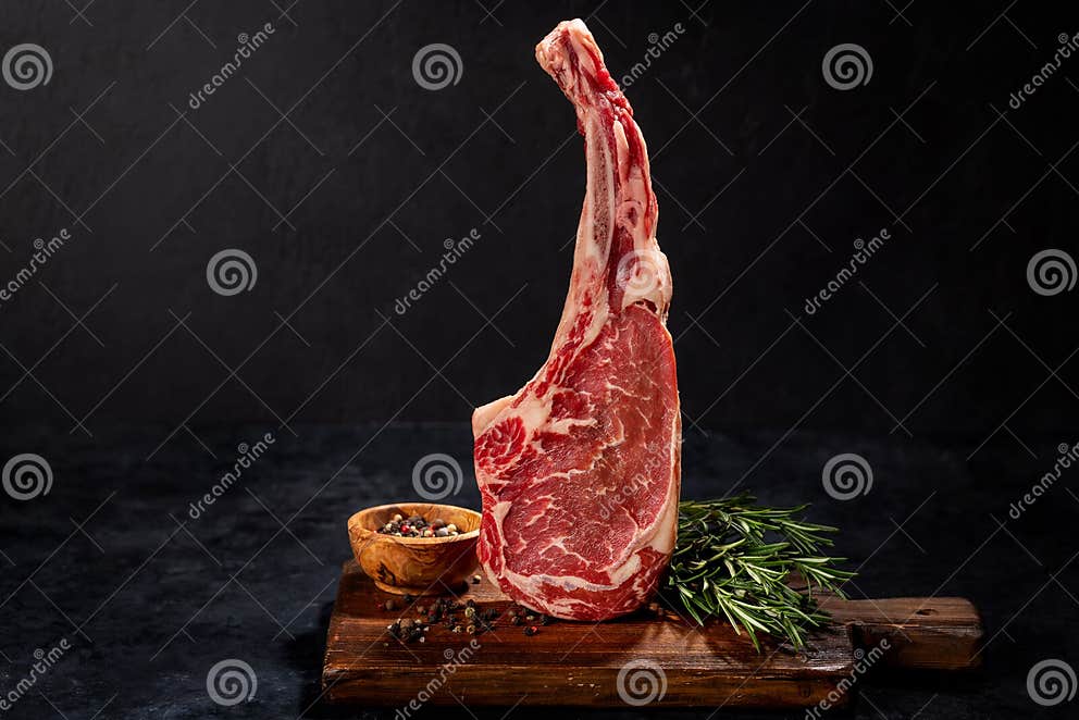 Raw Tomahawk Beef Steak and Spices Stock Photo - Image of slice ...