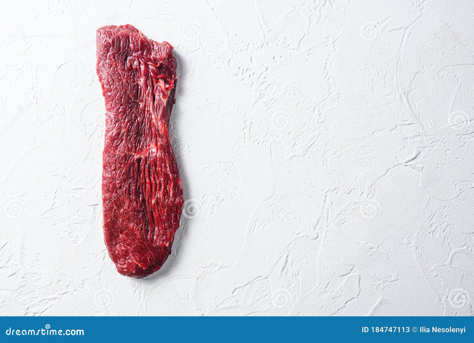 Raw Tri Tip, Bottom Sirloin Steak on a White Stone Background Top View ...