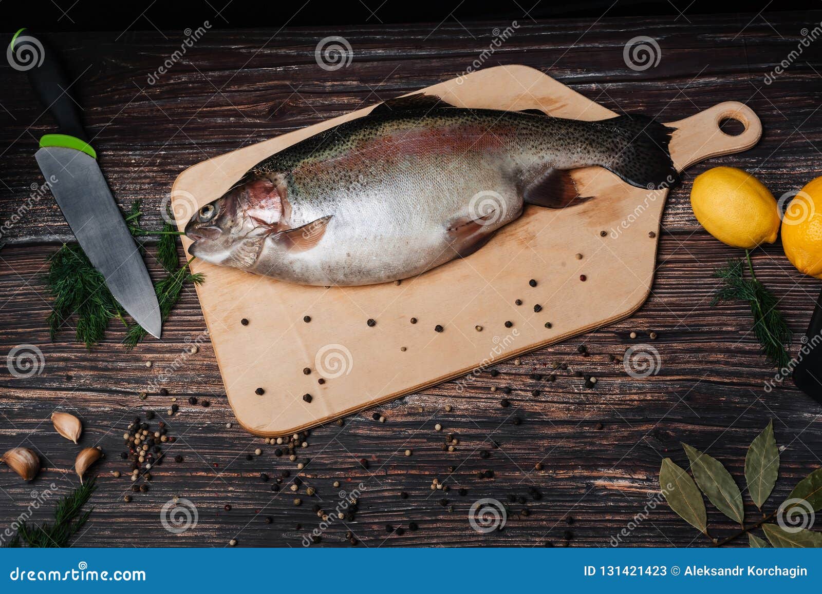 Raw Trout on a Board on a Table with Ingredients for Cooking. Fresh Red ...