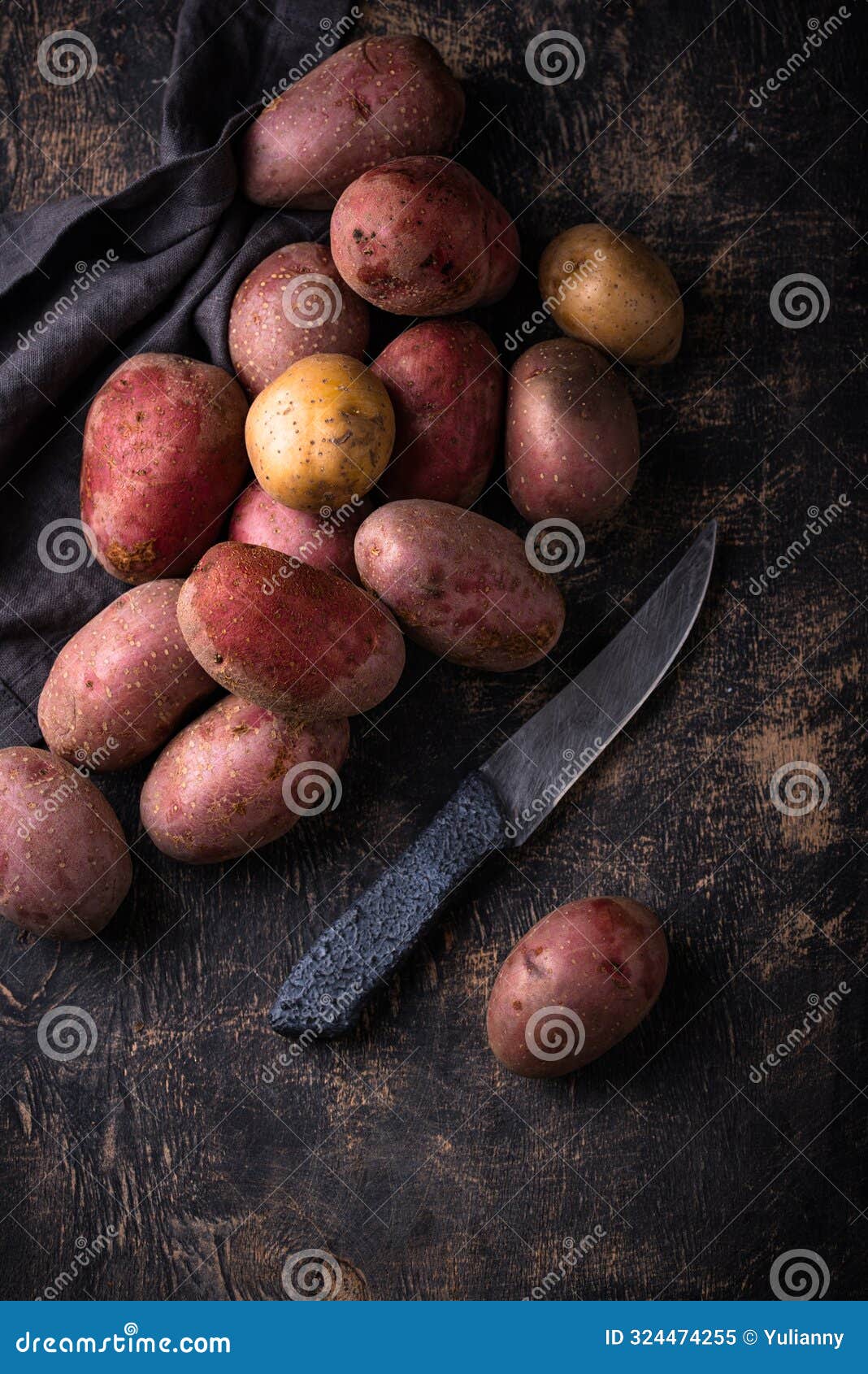 Raw Uncooked Potato on Dark Table Stock Image - Image of fresh ...