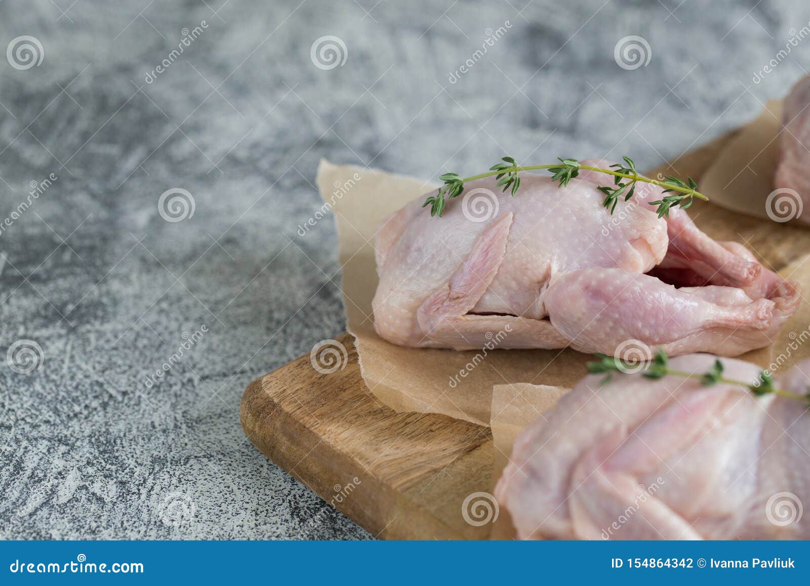 Raw Uncooked Quail. Raw Meat Quails Ready for Cooking on a Cutting ...