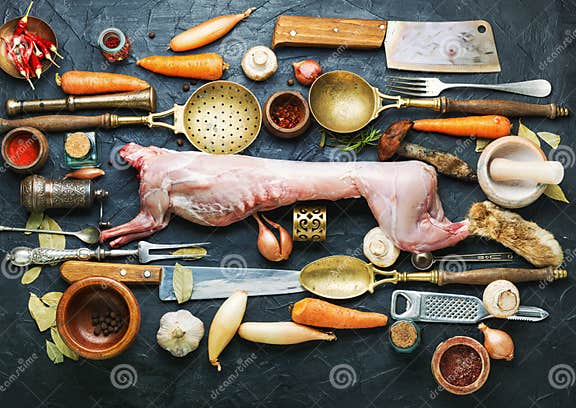 Raw uncooked rabbit stock photo. Image of leveret, knife - 206740716