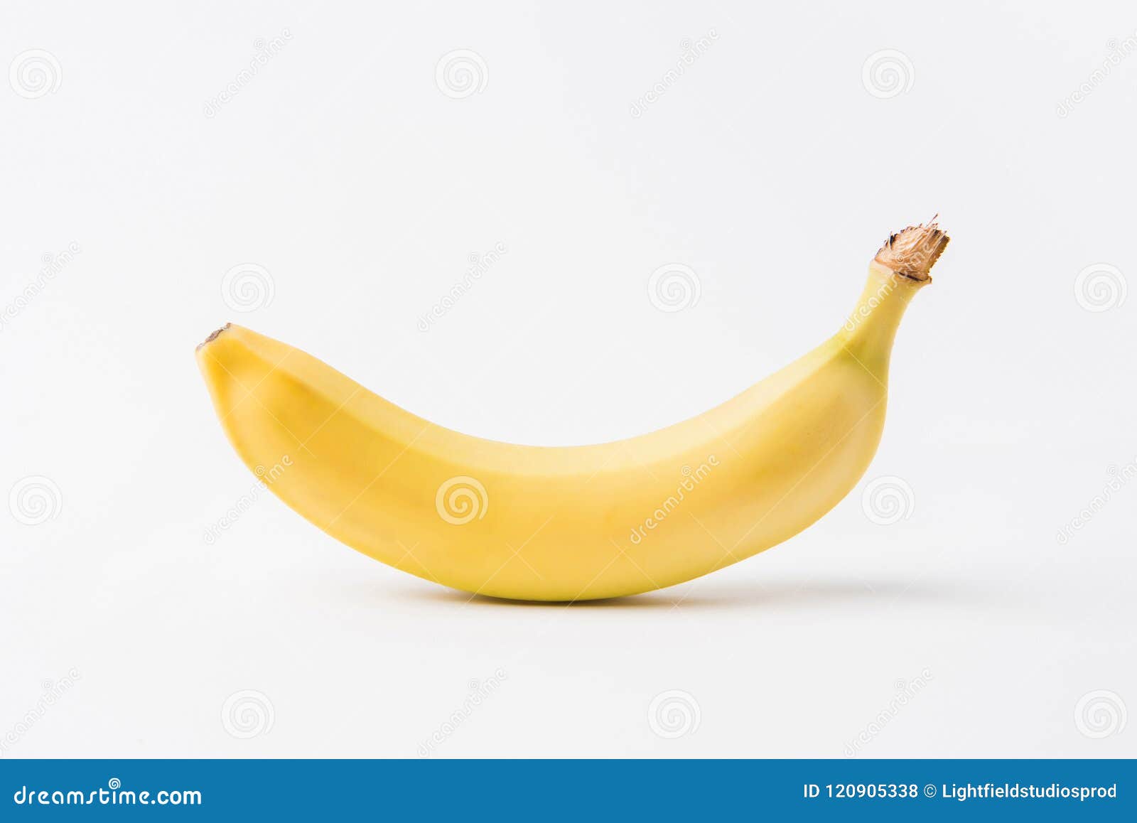 Raw Unpeeled Banana Laying on White Stock Photo - Image of fruit ...