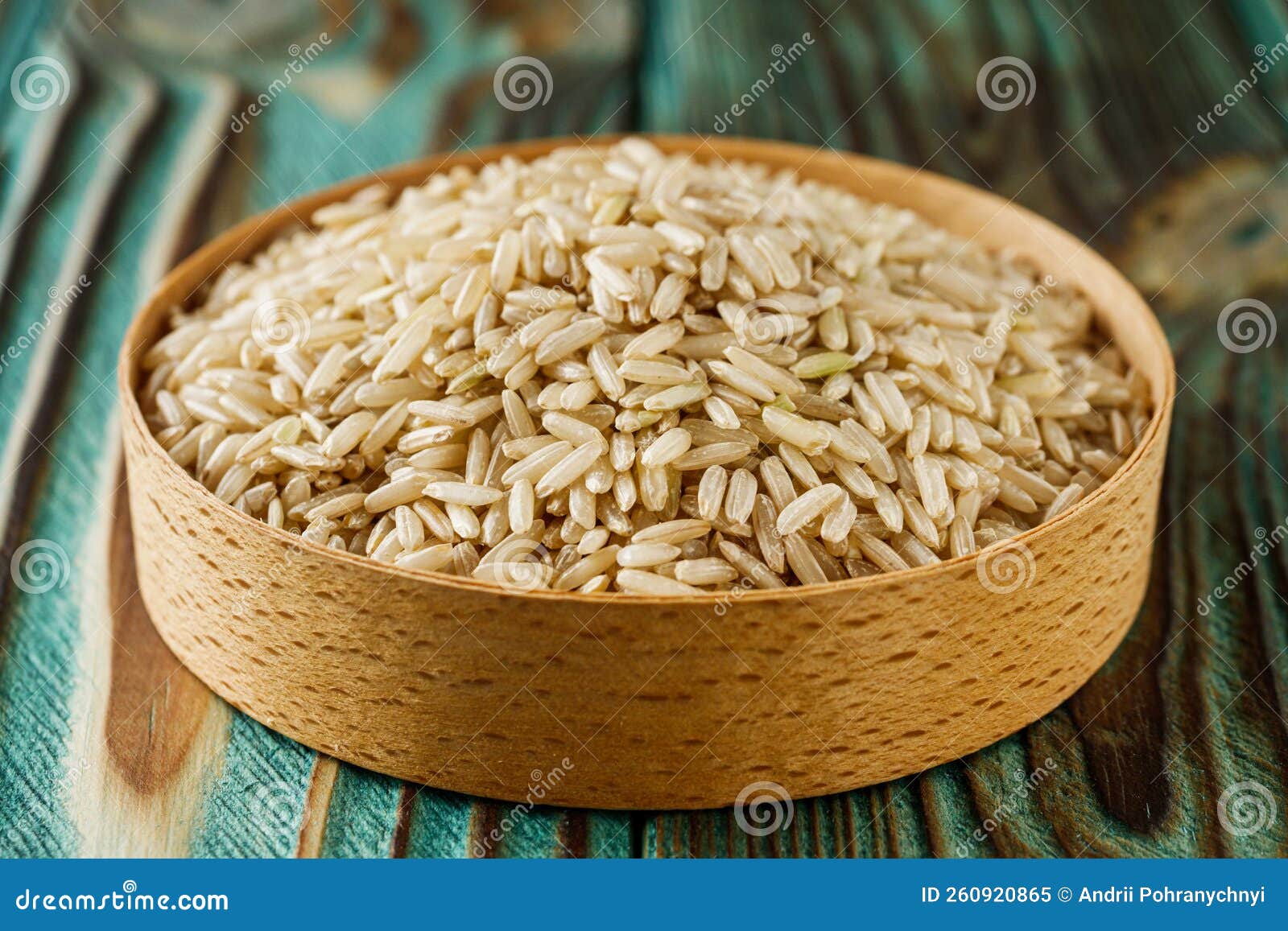 Raw Unpolished Rice on a Wooden Rustic Background Stock Image - Image ...