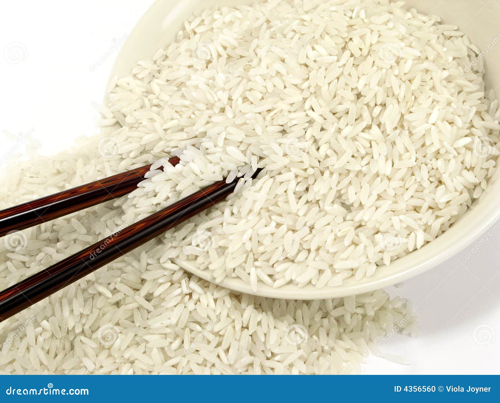 Raw White Rice with Chop Sticks Stock Photo - Image of food, rice: 4356560