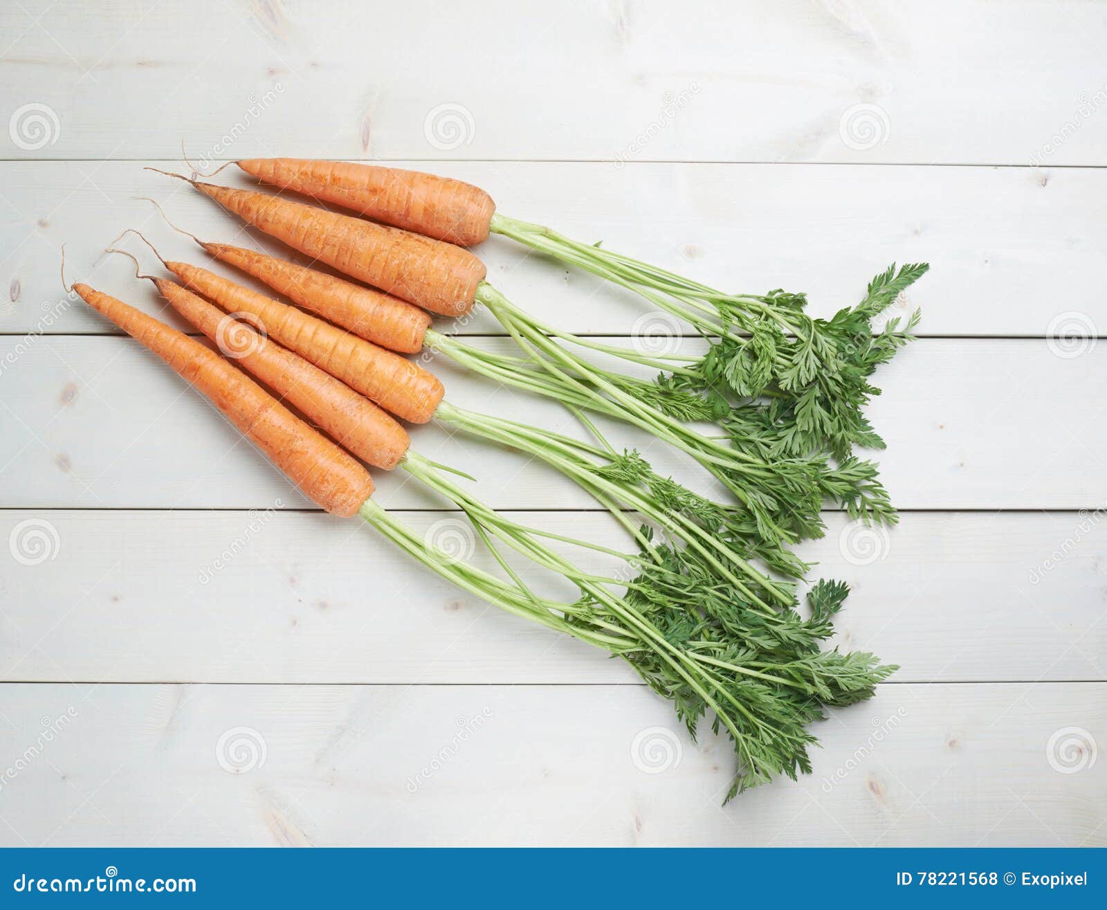 Raw Whole Carrot on Wooden Surface Table Stock Photo - Image of board ...