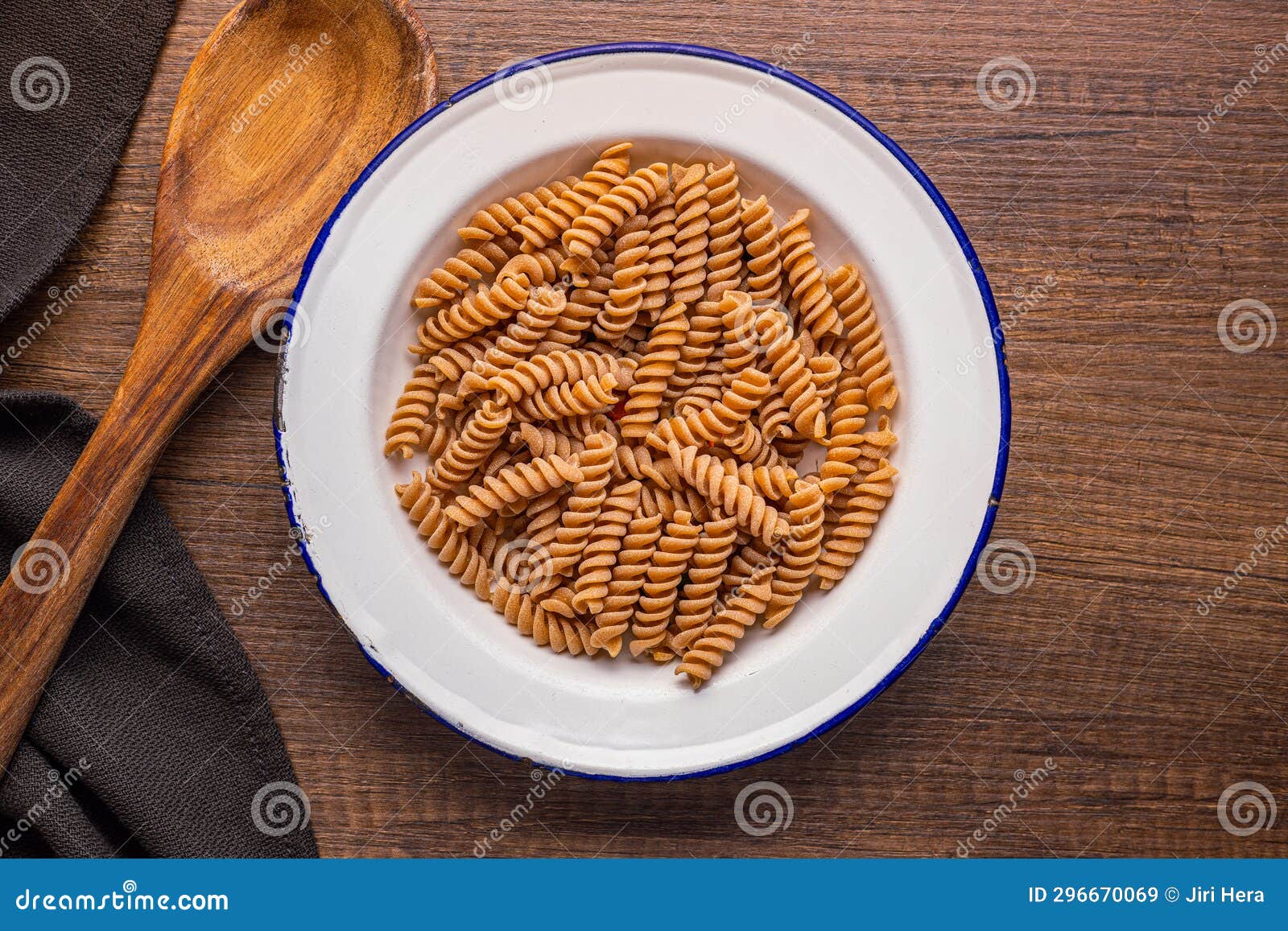 Raw Whole Grain Fusilli Pasta. Uncooked Pasta on Plate. Top View Stock ...