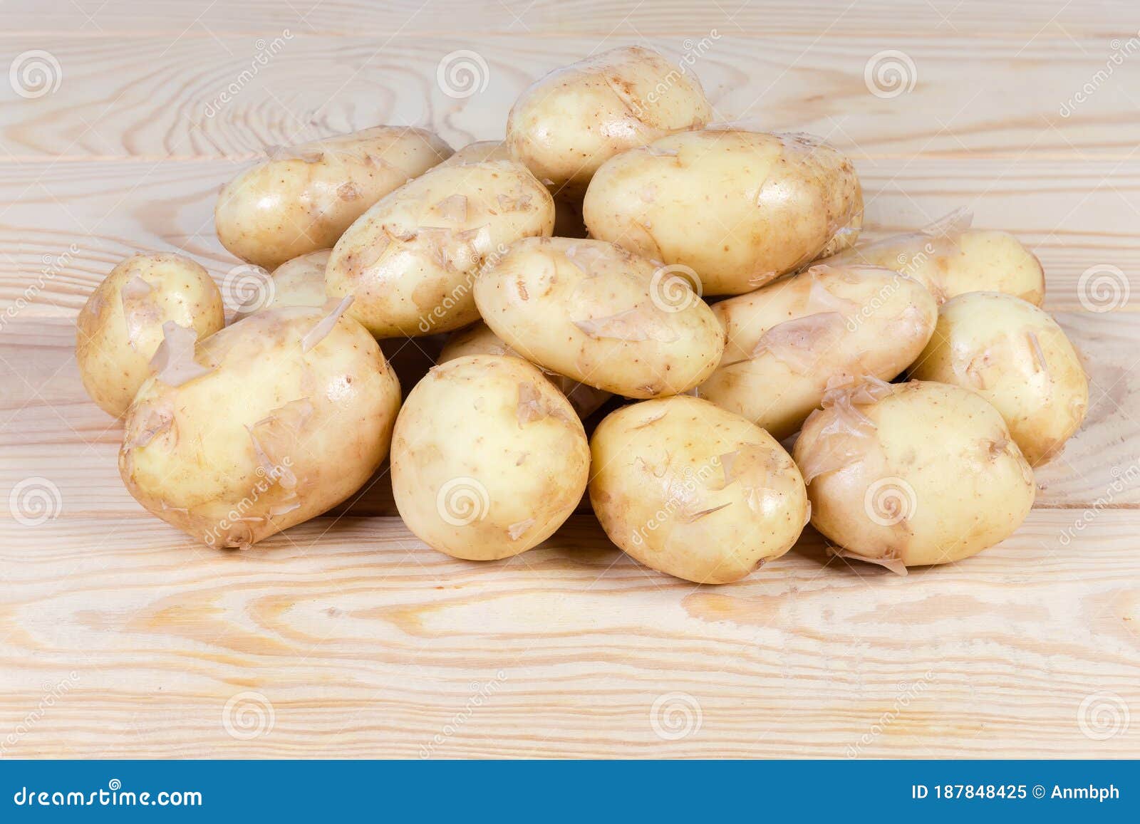 Raw Yellow Young Potatoes with Skin on the Rustic Table Stock Image ...