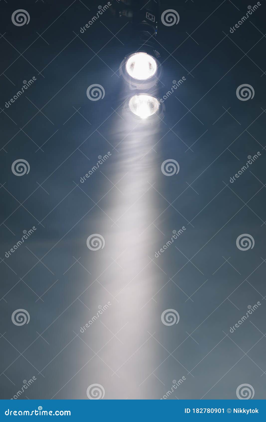 Ray of Double Pocket Flashlight in Smoke Stock Image - Image of ...