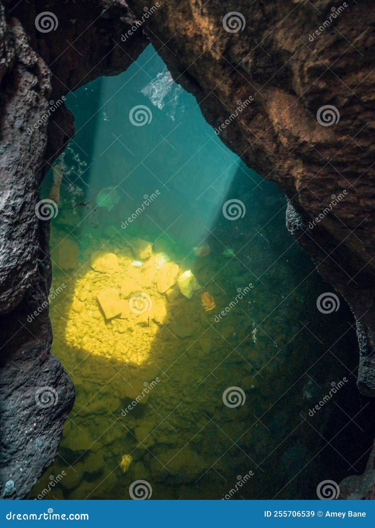 A Ray of Light Hitting the Water and Making Light Trails Stock Image ...