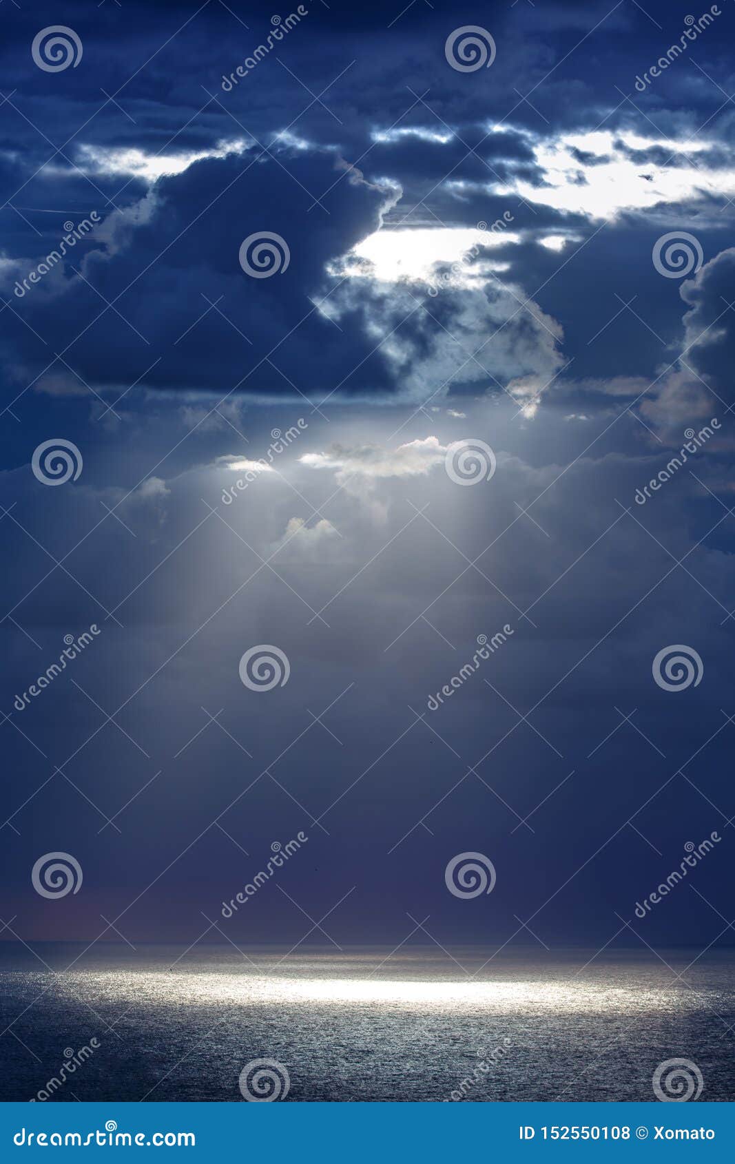 Ray of light over the sea stock photo. Image of ocean - 152550108