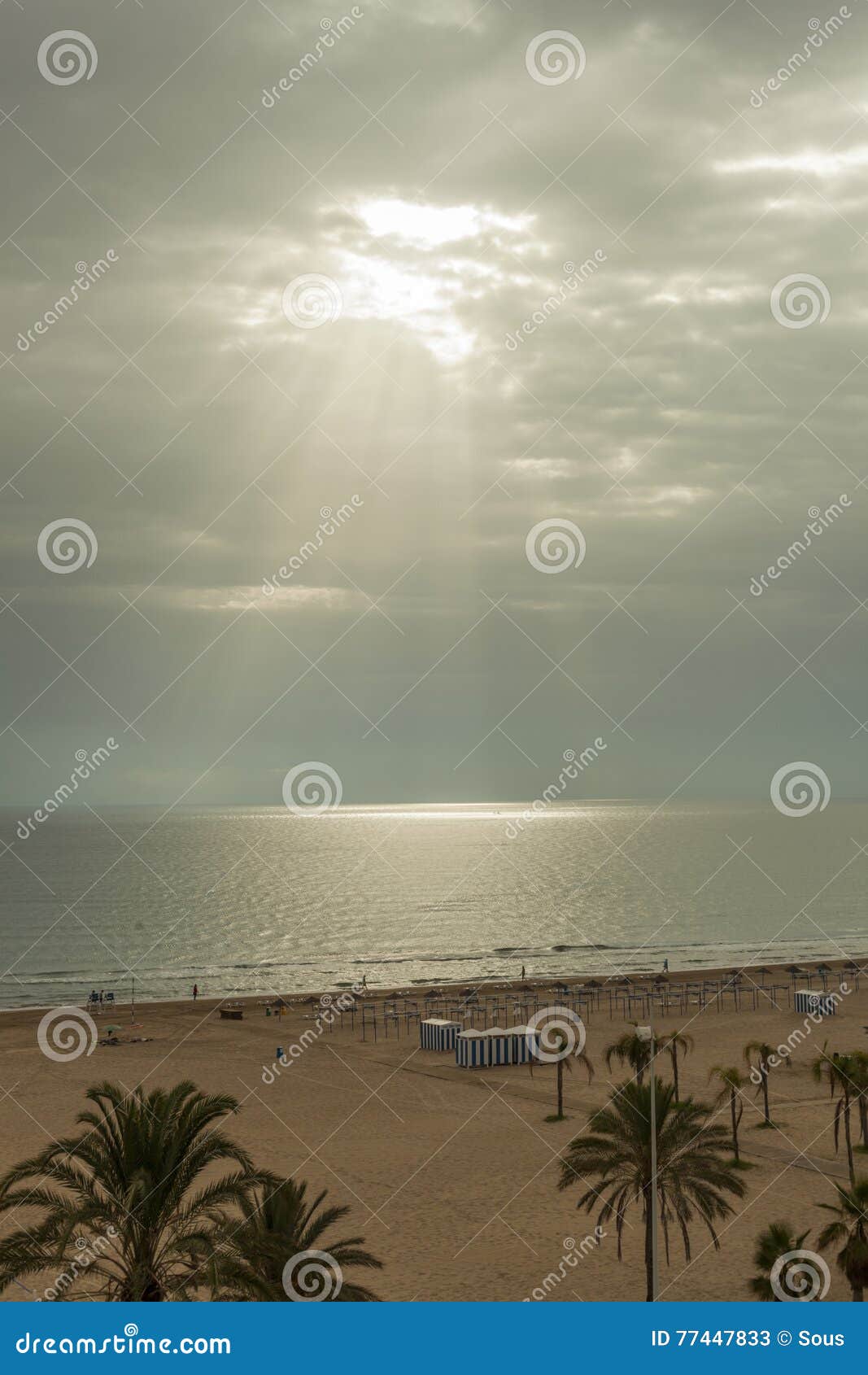 Ray of Sun through the Clouds Lighting the Horizon Line between Stock ...