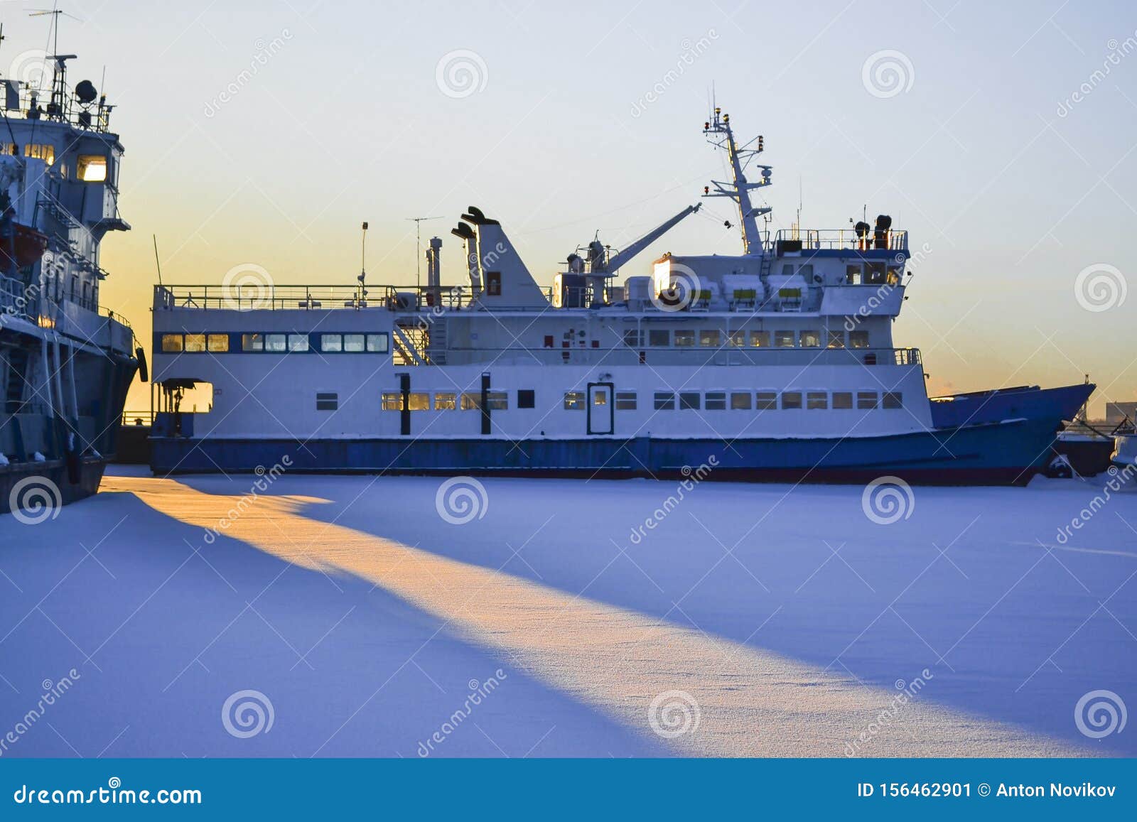 Ray of Sun between Two Ships Frozen in Ice Stock Image - Image of ...
