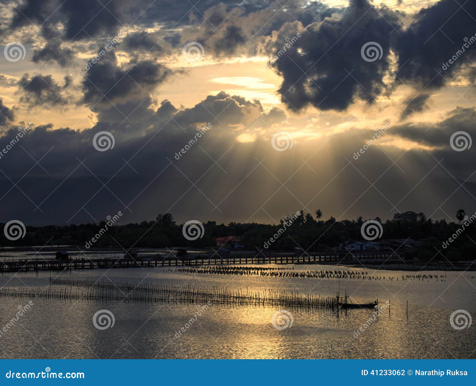 A Ray of Sunlight Breaking through Dark Clouds Stock Photo - Image of ...