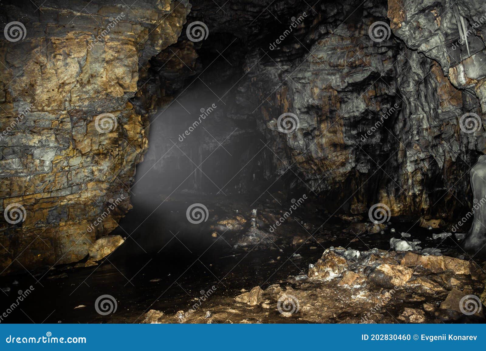 Beam of Light at the Exit from the Cave Stock Photo - Image of wall ...