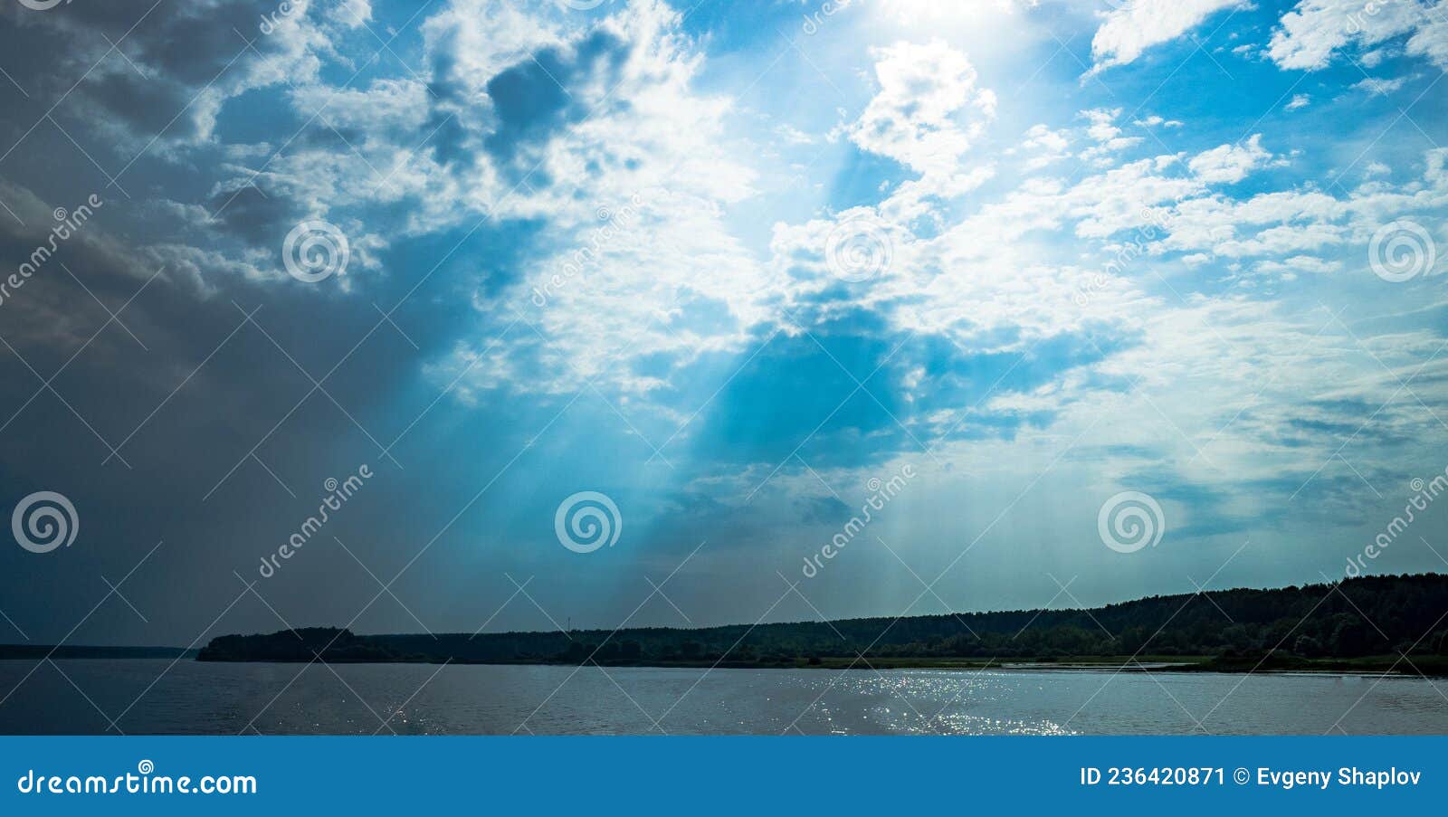 The Rays of God in the River Landscape. the Sun S Rays Shine through ...