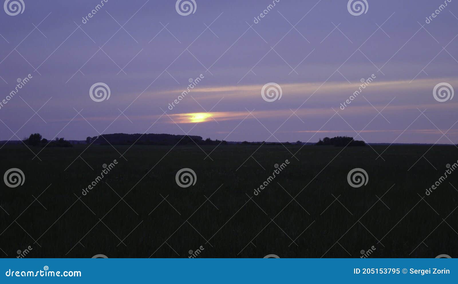 Rays of the Late Sunset Over the Endless Field in the Twilight of the ...